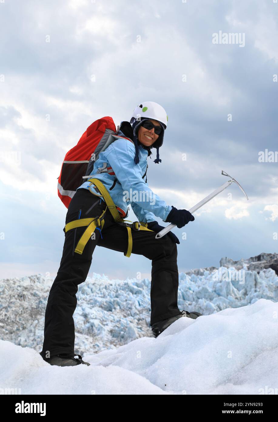 The girl climbing on the icy top of Falljokull Glacier (Falling Glacier ...