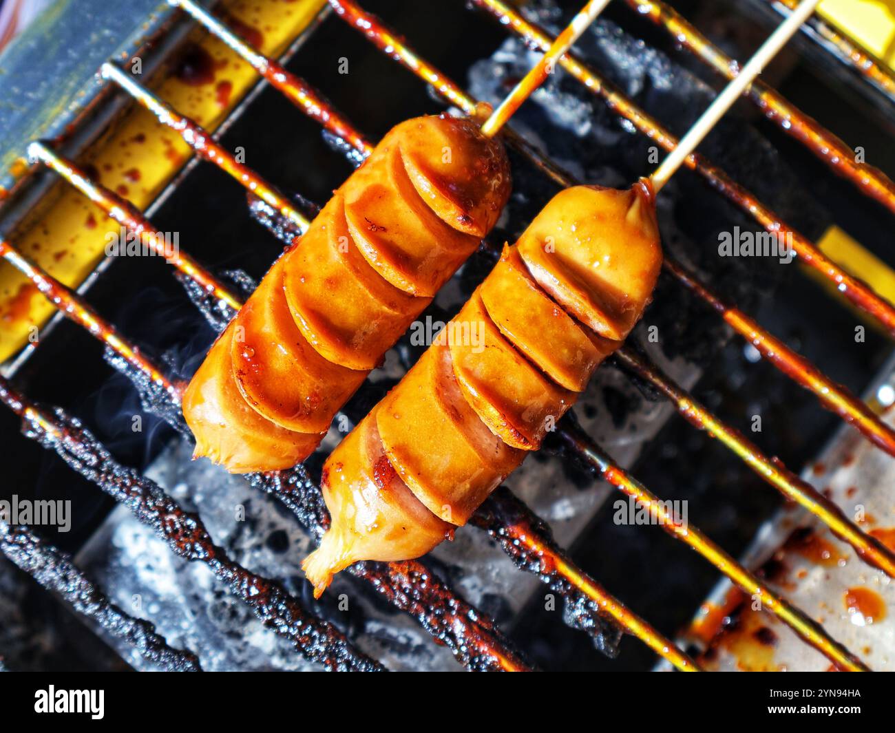 Sausages being cooked on the grill,Hot and spicy sausage on grill Stock ...