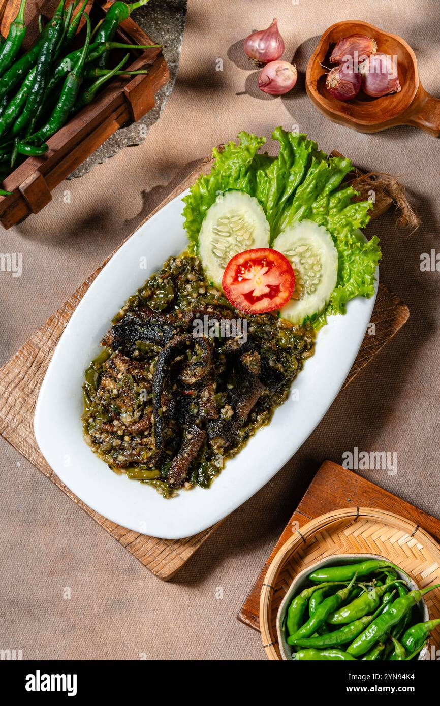 Fried eel with green chili sauce or belut goreng cabe ijo is a ...