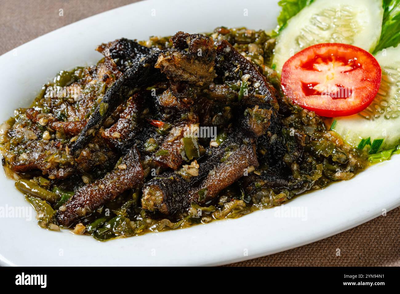 Fried eel with green chili sauce or belut goreng cabe ijo is a ...