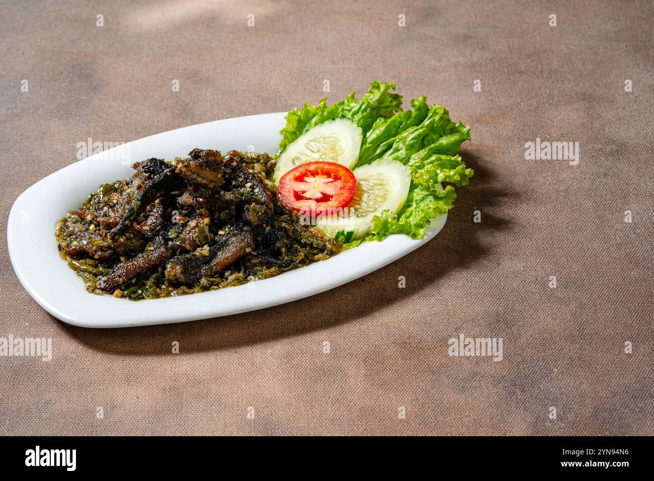Fried eel with green chili sauce or belut goreng cabe ijo is a ...