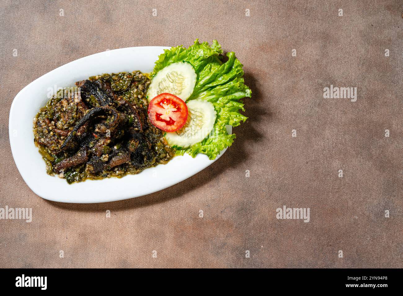Fried eel with green chili sauce or belut goreng cabe ijo is a ...