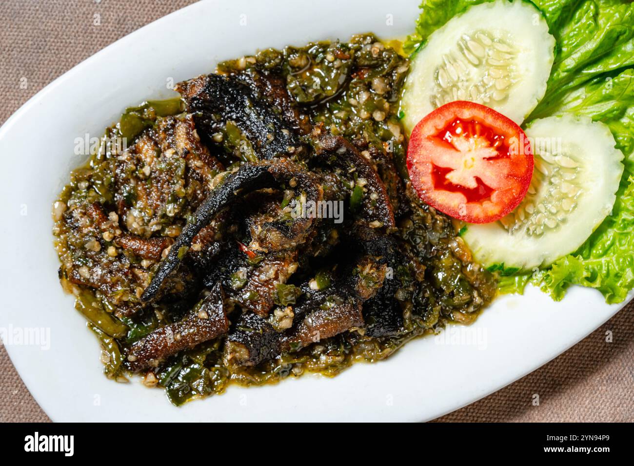 Fried eel with green chili sauce or belut goreng cabe ijo is a ...
