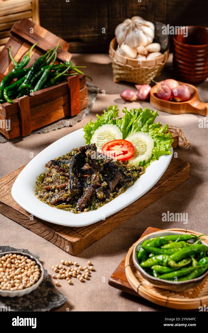 Fried eel with green chili sauce or belut goreng cabe ijo is a ...