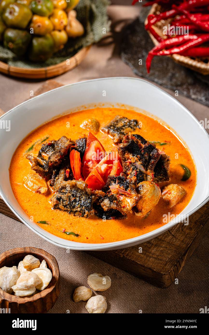 Fried eel curry with asam cikala or belut asam cikala cooked in spicy ...