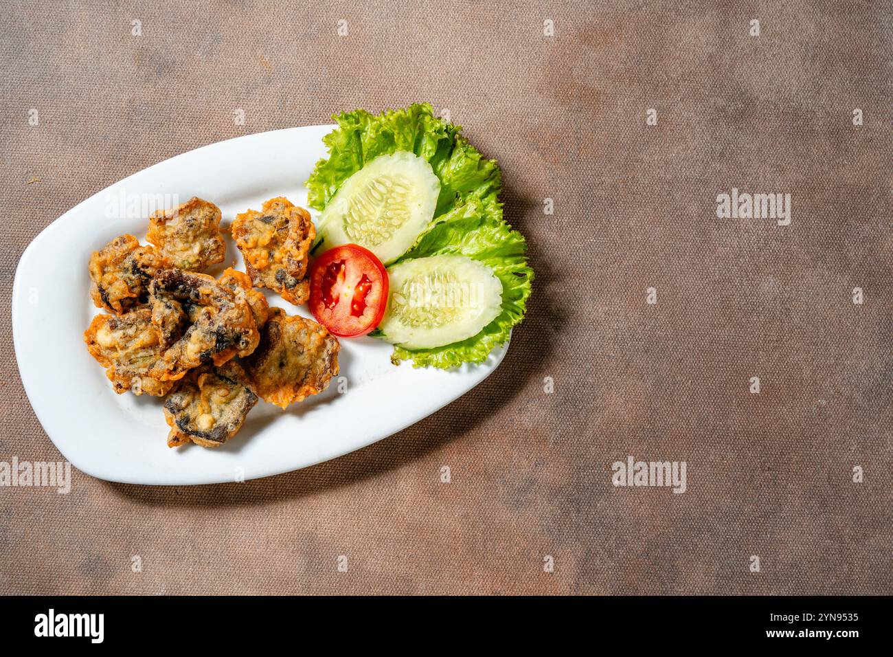 Fried eel or belut goreng in Indonesian, is a popular dish made from ...