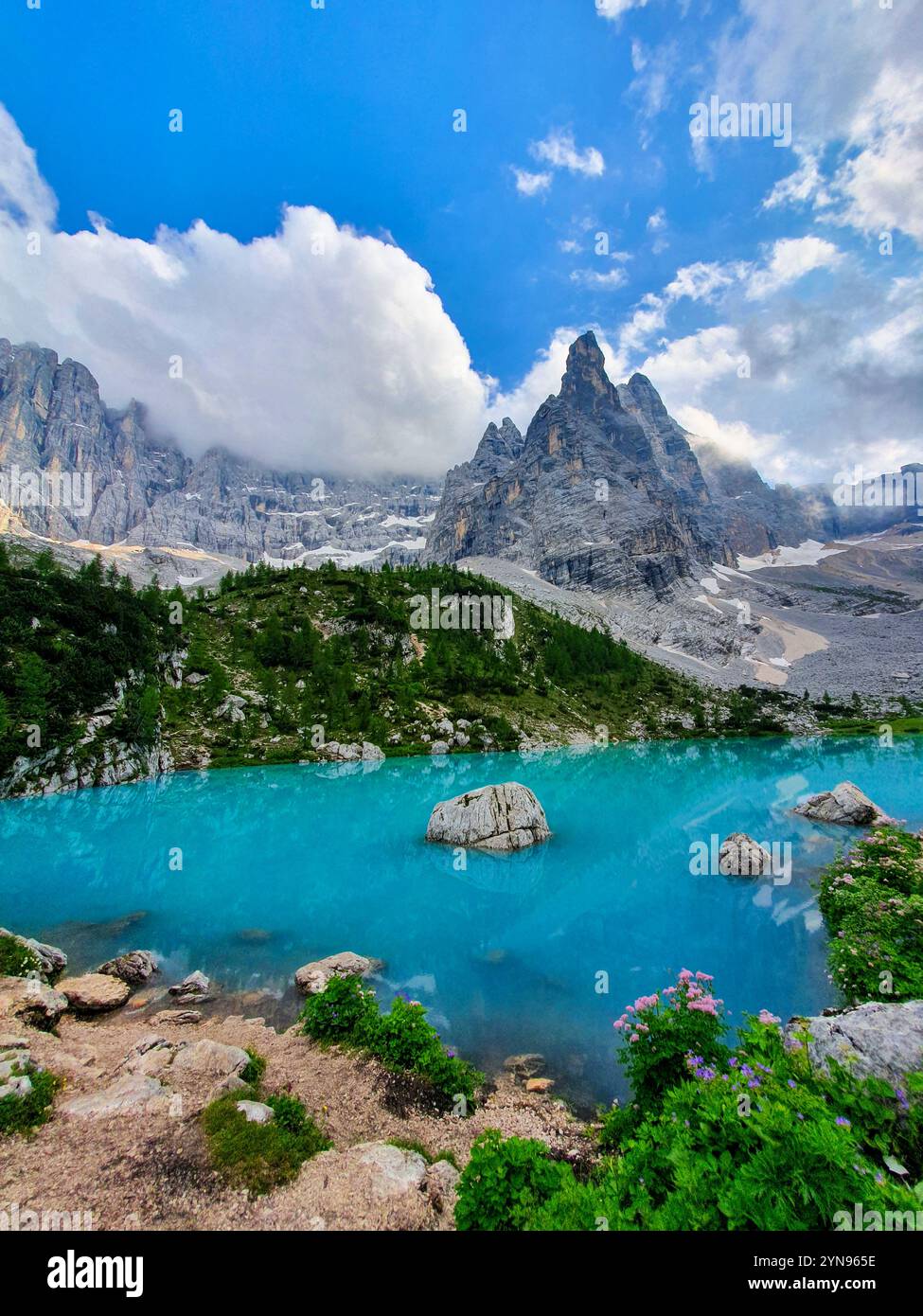 Beneath towering dolomite peaks hi-res stock photography and images - Alamy