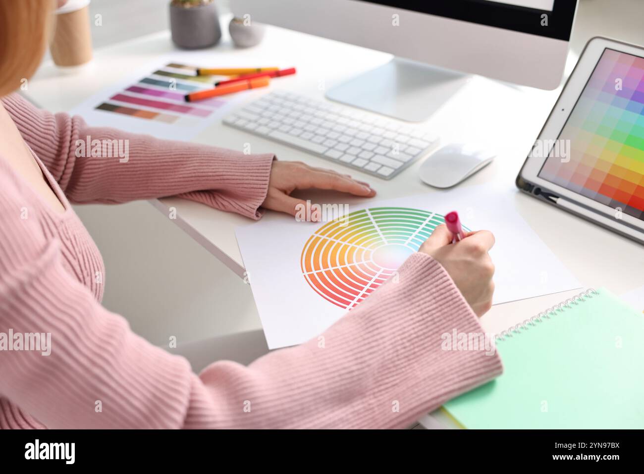 Designer working with color palette at table in office, closeup Stock ...
