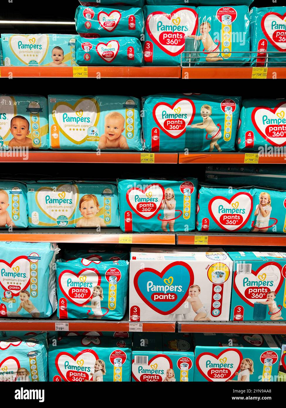 Kyiv, Ukraine - November 24, 2024: A selection of various baby diapers ...