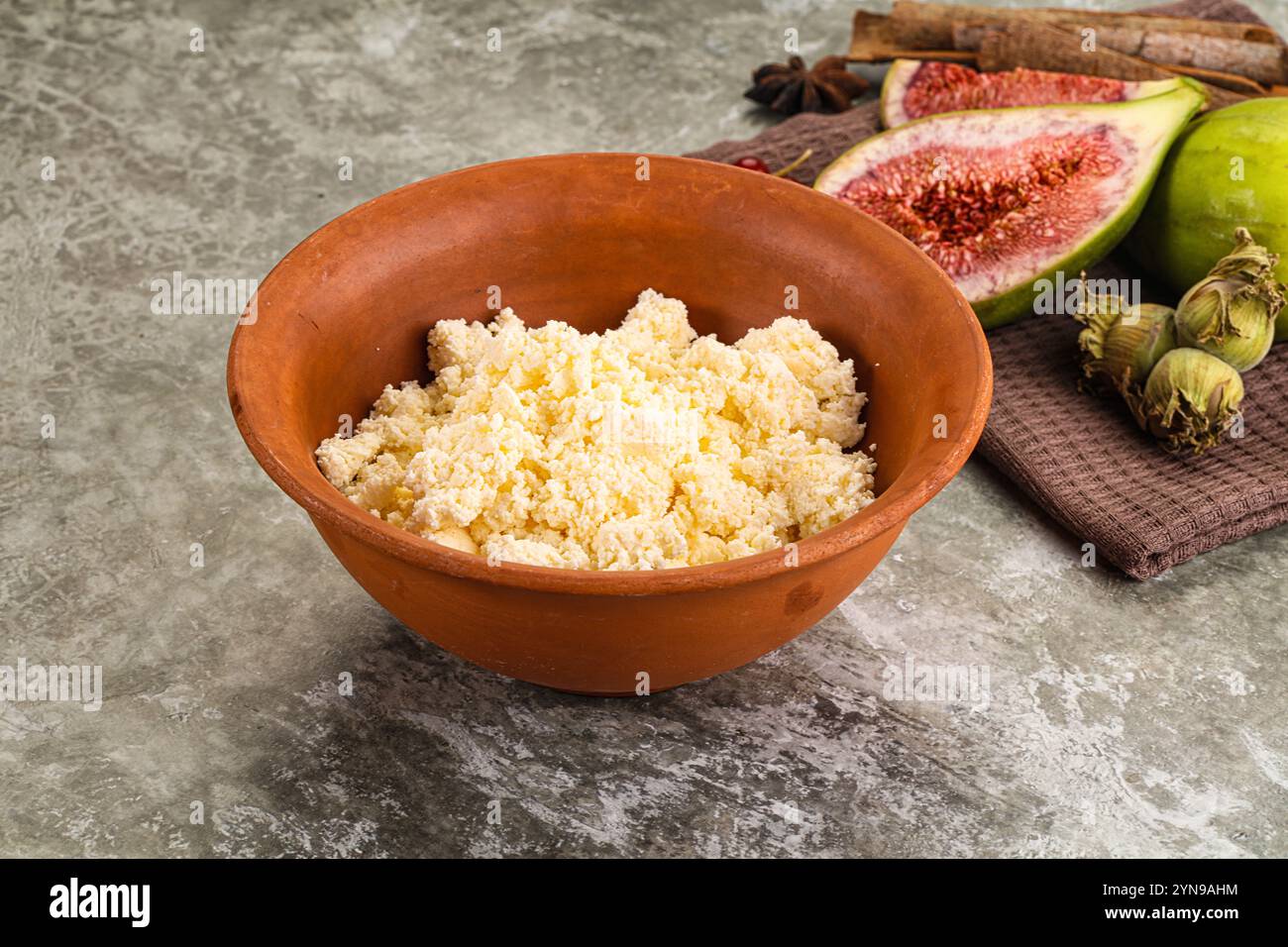 Delicous sheep cottage cheese curd served fig Stock Photo - Alamy