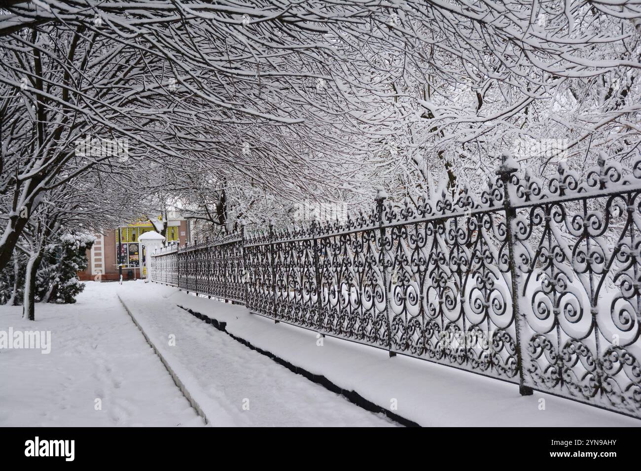 Winter pathway. Winter landscape of a path covered with snow and a snow ...