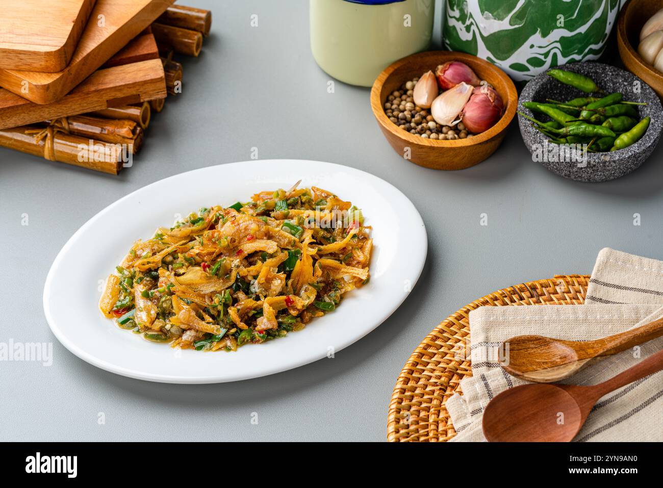 Fried anchovy cooked with green chili or ikan teri cabe ijo is a ...