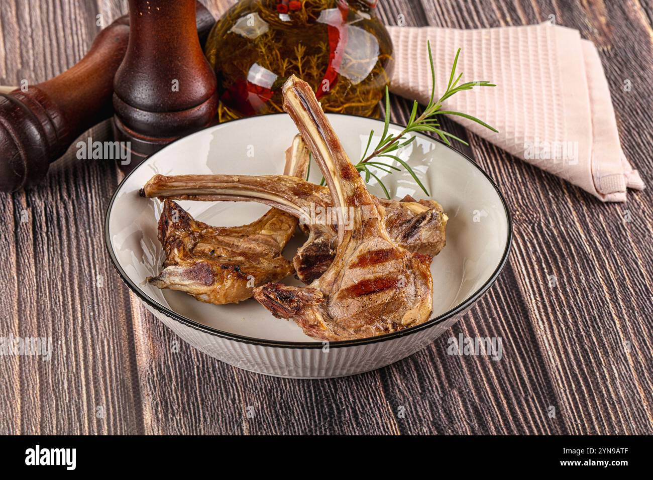 Delicous Grilled square rib of lamb served rosemary Stock Photo - Alamy