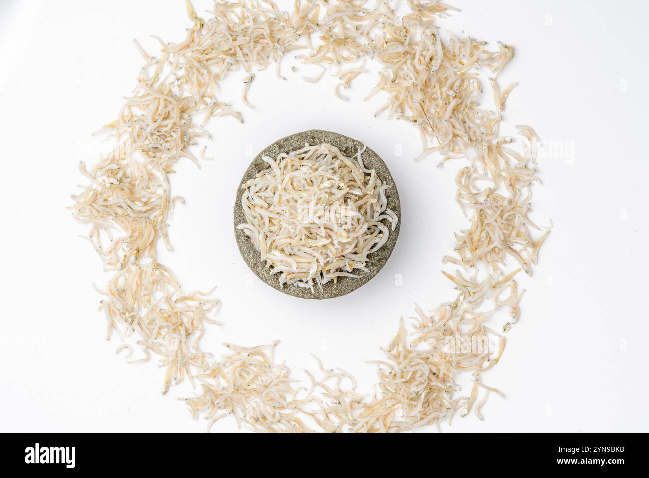 Fresh dried anchovies on White Background. Raw dry salted sea fish ...