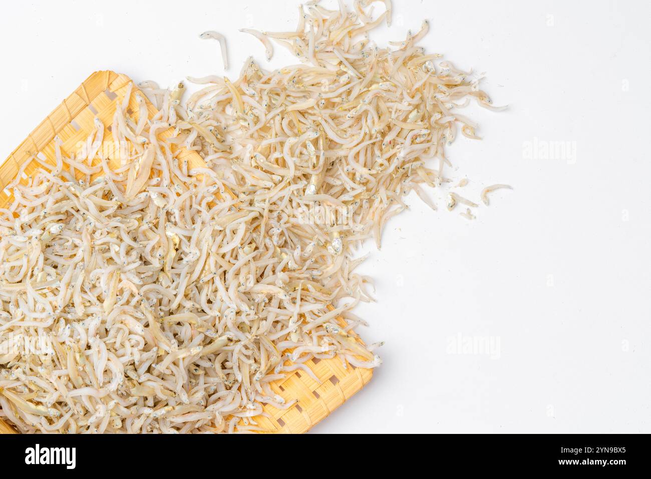Fresh dried anchovies on White Background. Raw dry salted sea fish ...