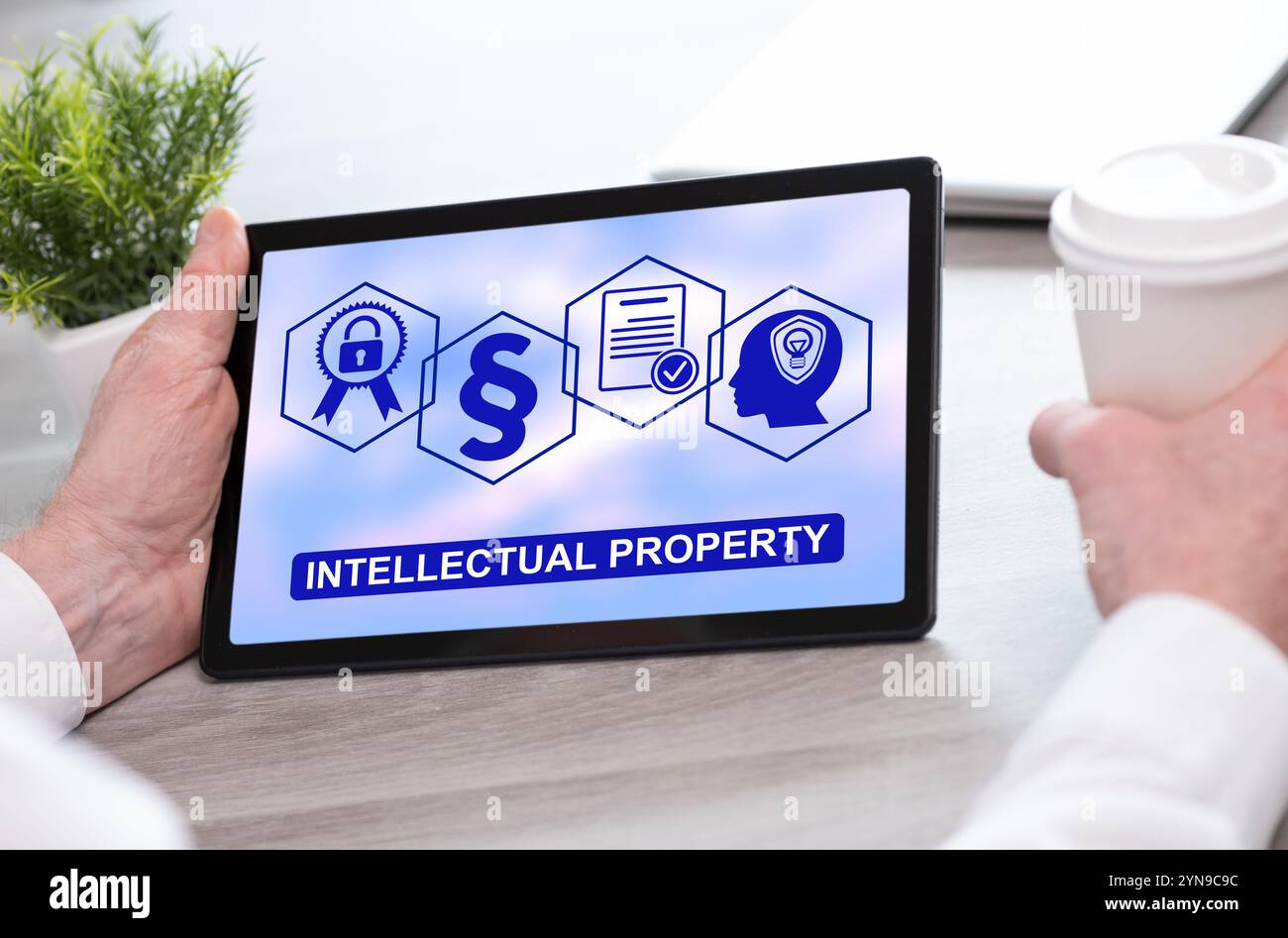 Tablet screen displaying an intellectual property concept Stock Photo ...