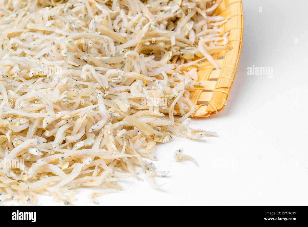 Fresh dried anchovies on White Background. Raw dry salted sea fish ...