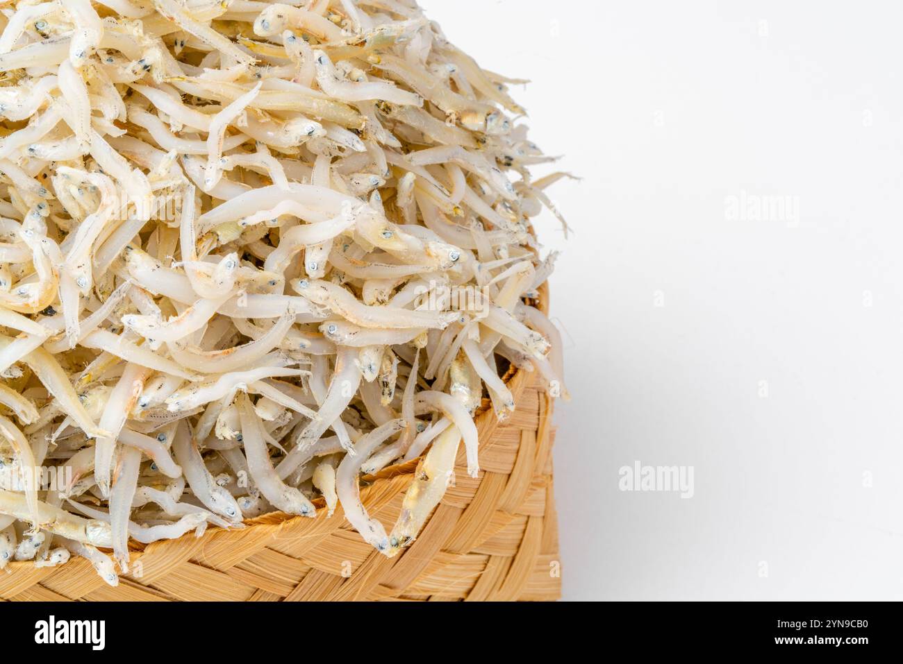 Fresh dried anchovies on White Background. Raw dry salted sea fish ...
