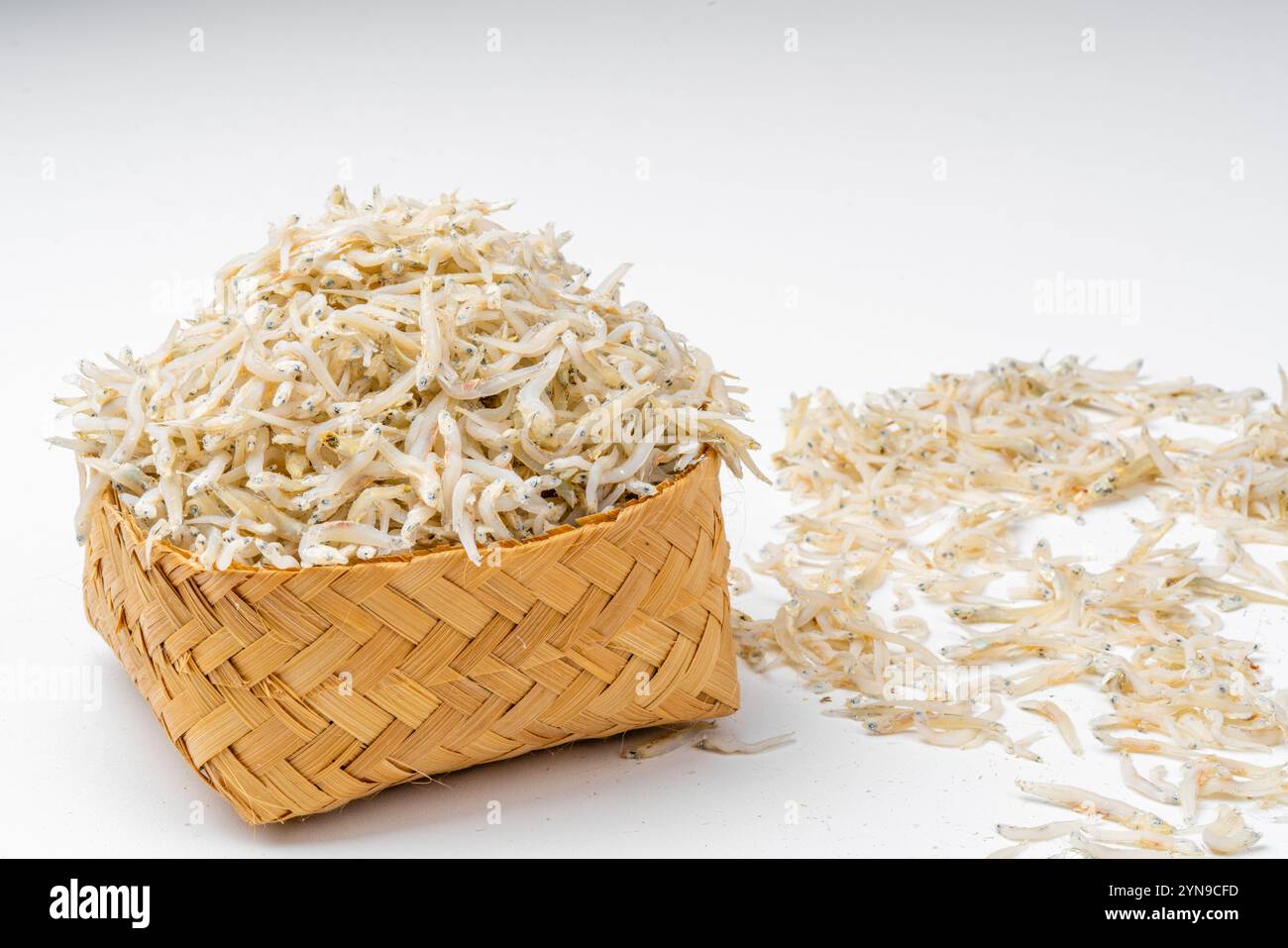 Fresh dried anchovies on White Background. Raw dry salted sea fish ...