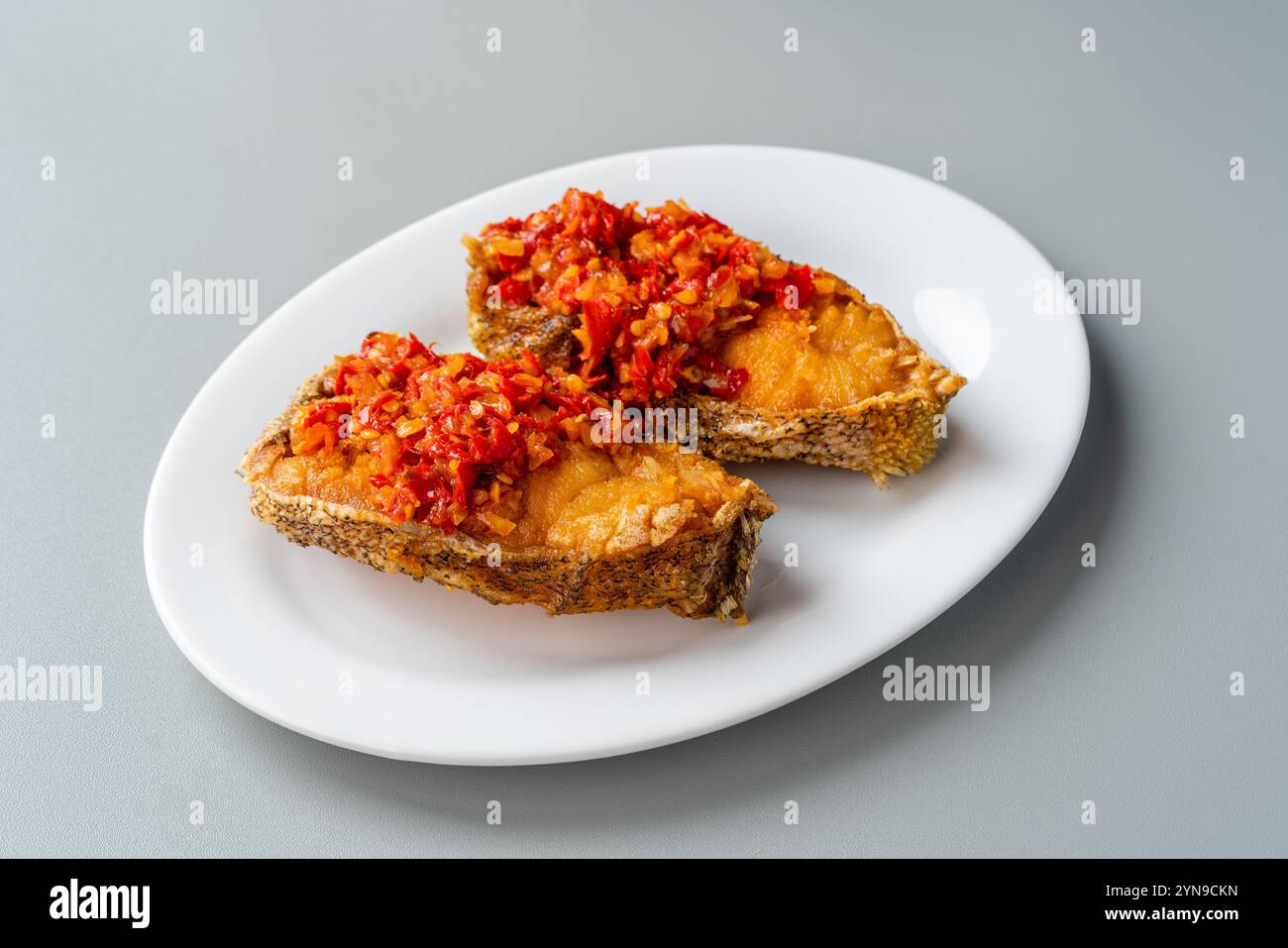 Ikan goreng balado is one of the traditional food from west sumatra ...