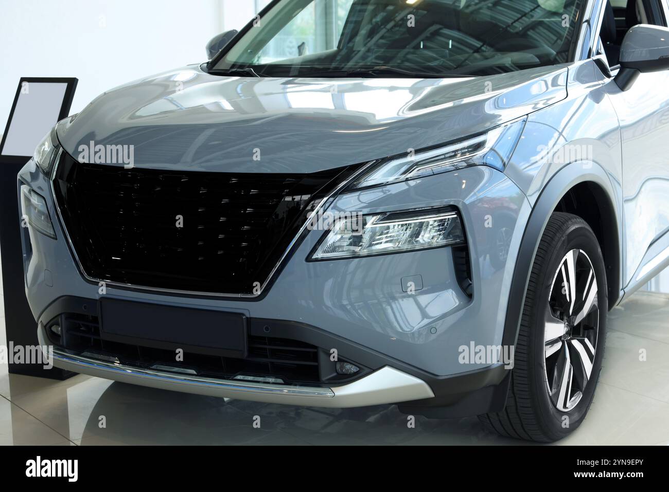 Luxury vehicle. New modern grey car in salon Stock Photo - Alamy