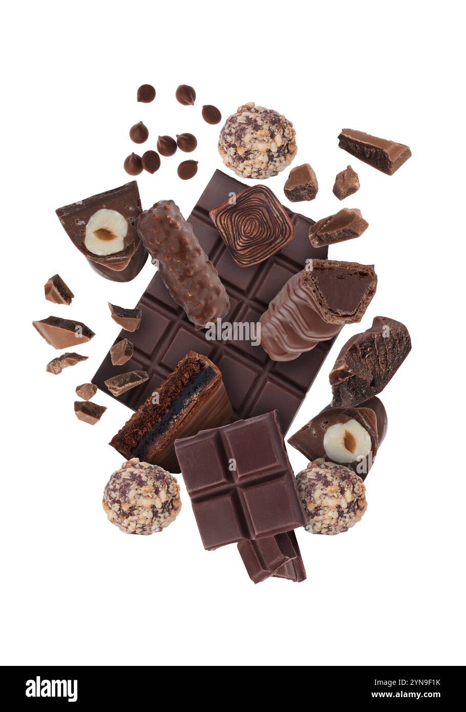 Different chocolate products in air on white background Stock Photo - Alamy