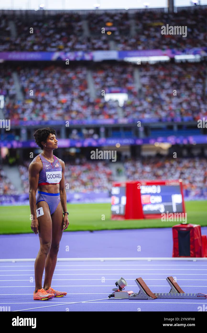 Anna Cockrell participating in the 400 meters hurdles at the Paris 2024 ...