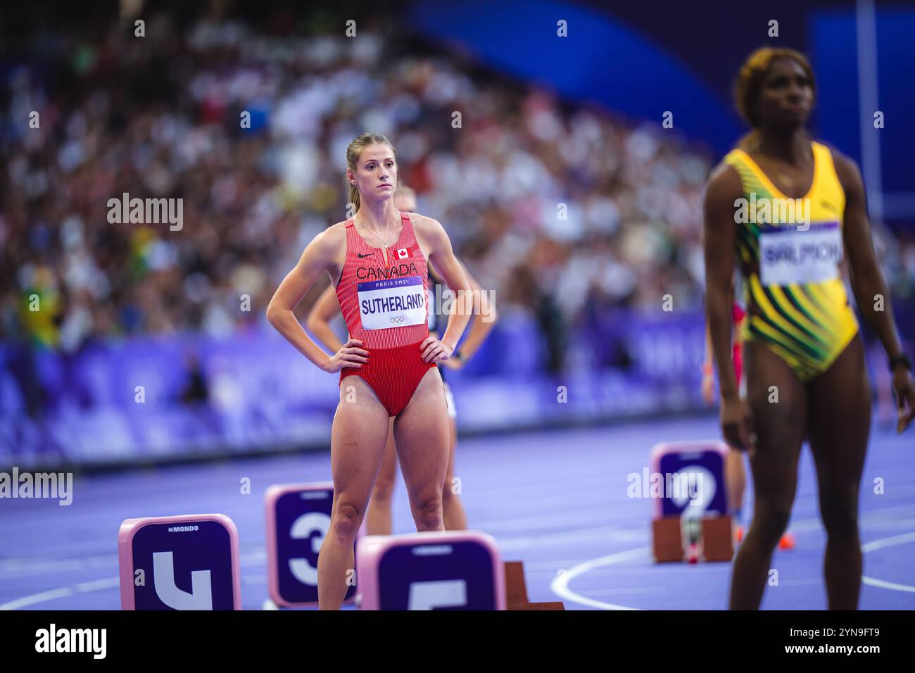 Savannah Sutherland participating in the 400 meters hurdles at the ...