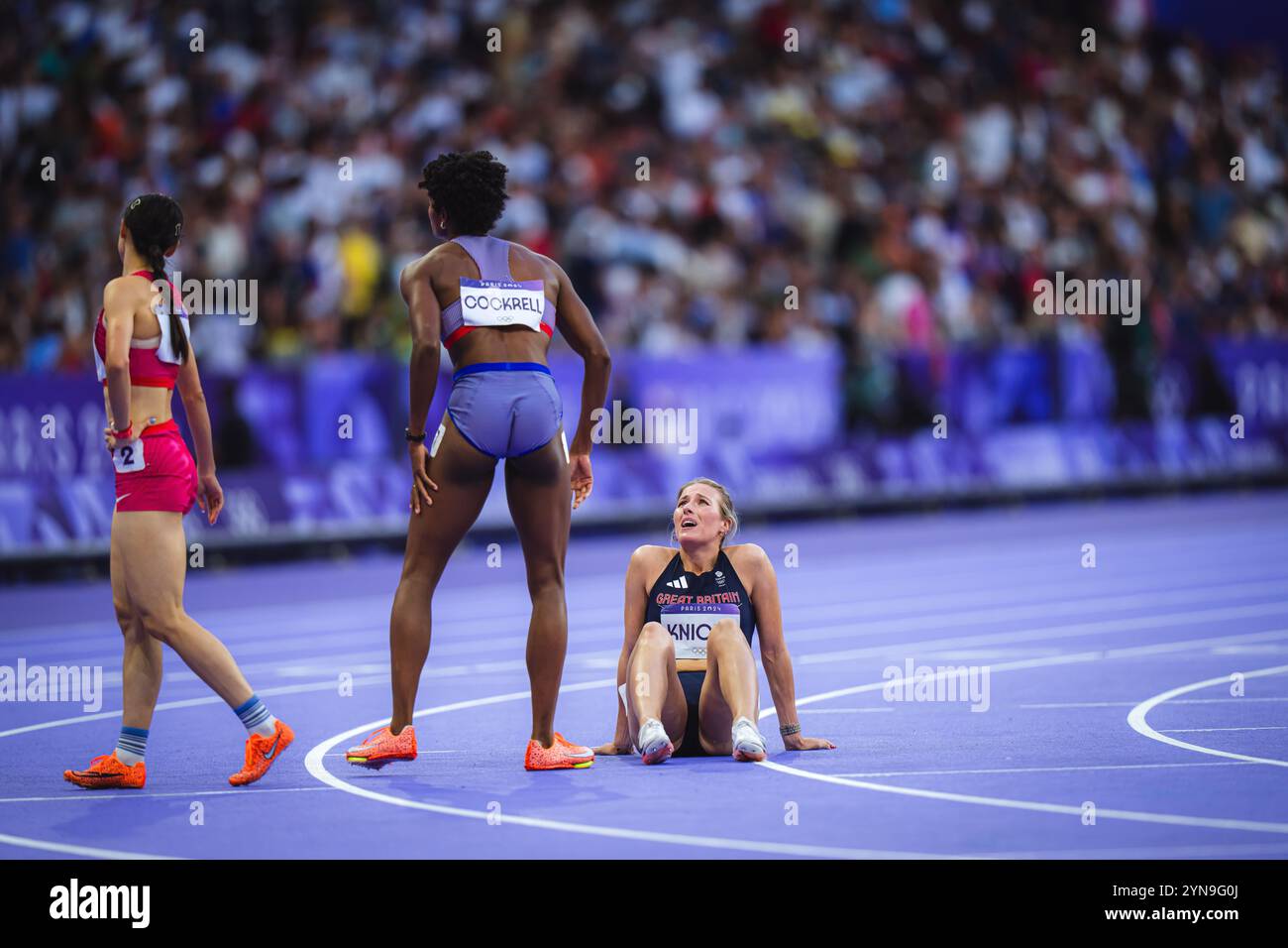 Jessie Knight participating in the 400 meters hurdles at the Paris 2024 ...