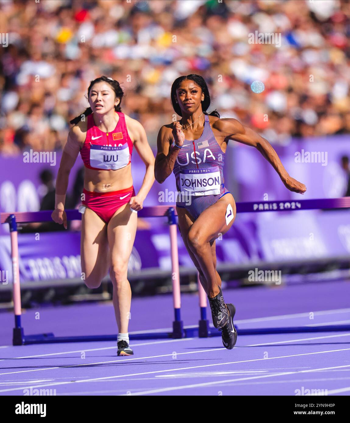 Alaysha Johnson participating in the 100 meters hurdles at the Paris ...