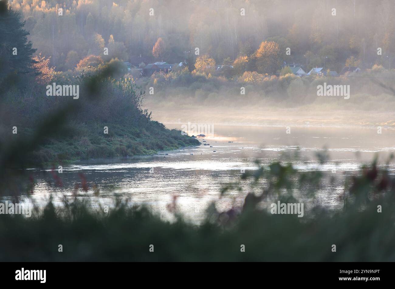 Mist over river near village hi-res stock photography and images - Alamy