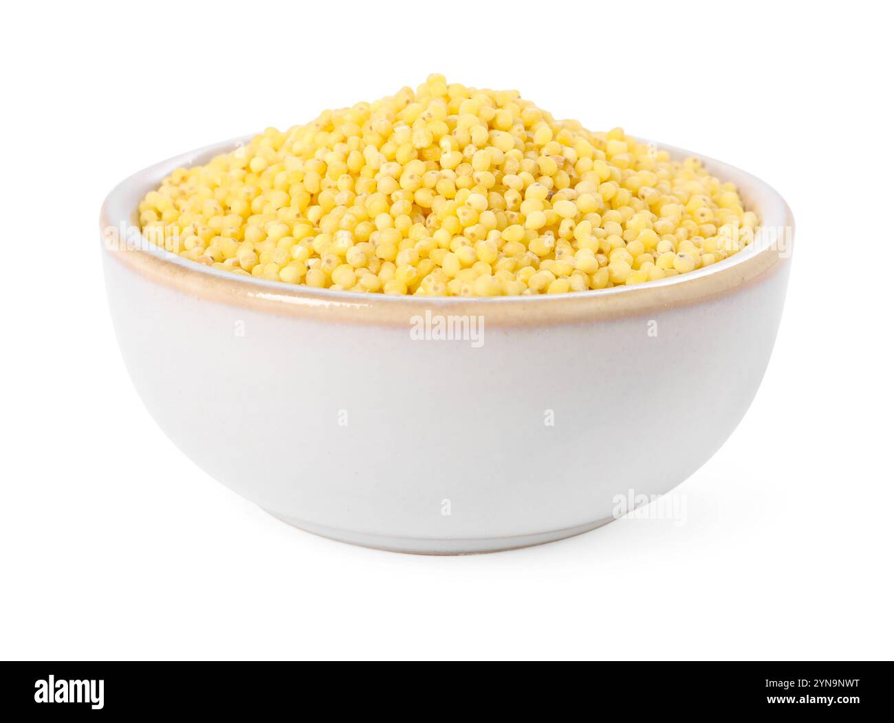 Millet groats in bowl isolated on white Stock Photo - Alamy