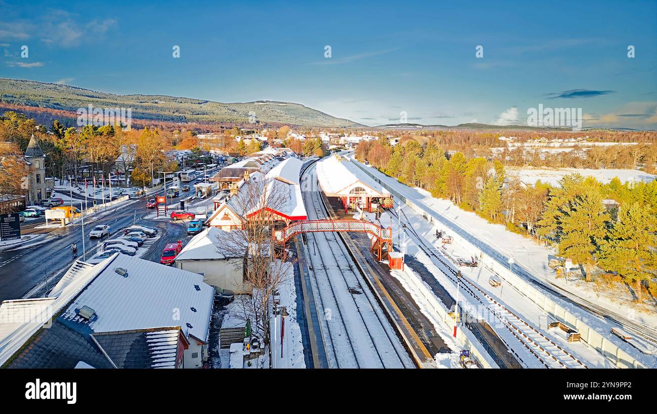 Aviemore Highland Scotland blue sky and winter snowfall over the town ...
