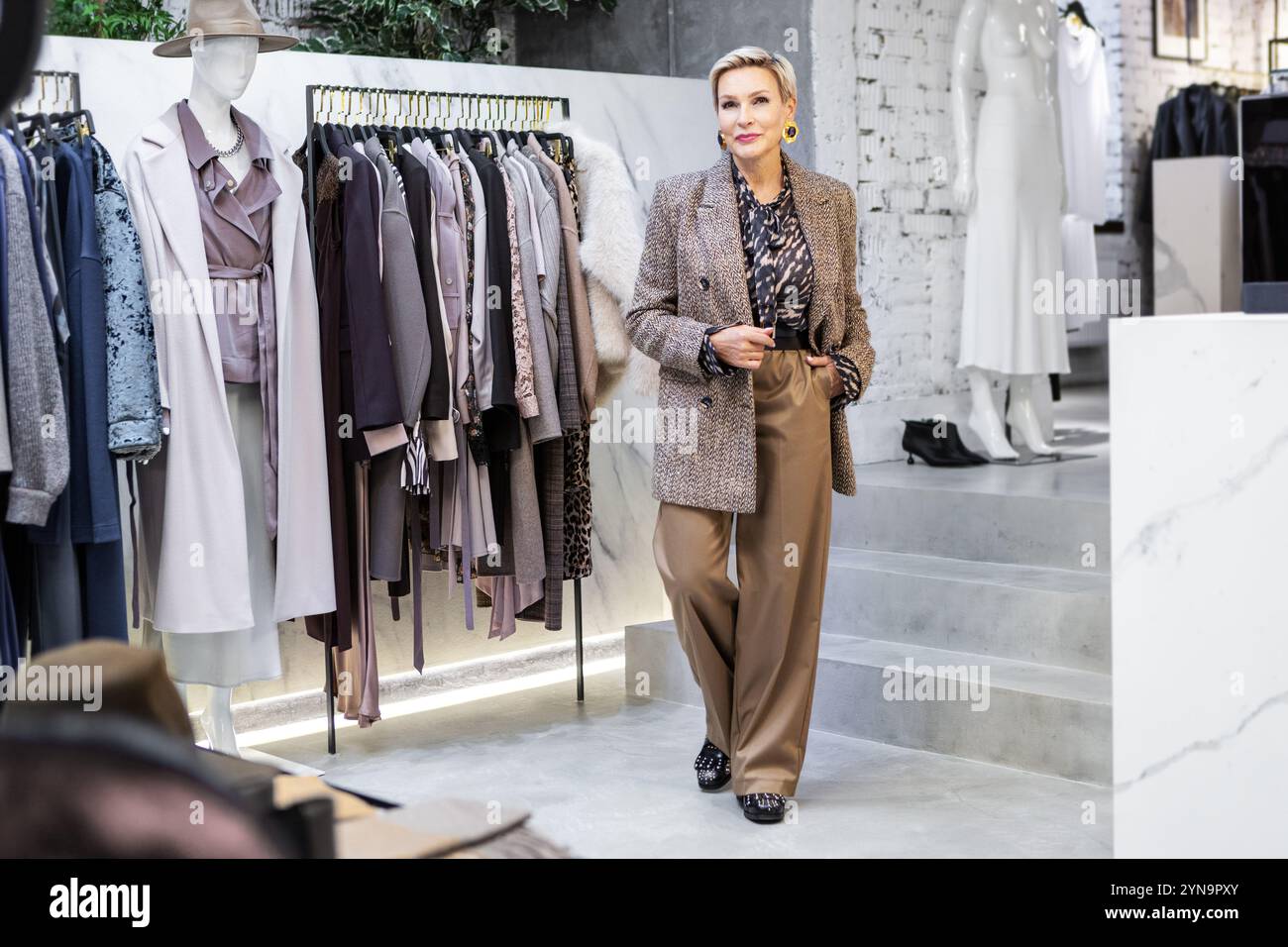 Stylish Mature Woman in Fashionable Clothing Business Outfit With Beige ...