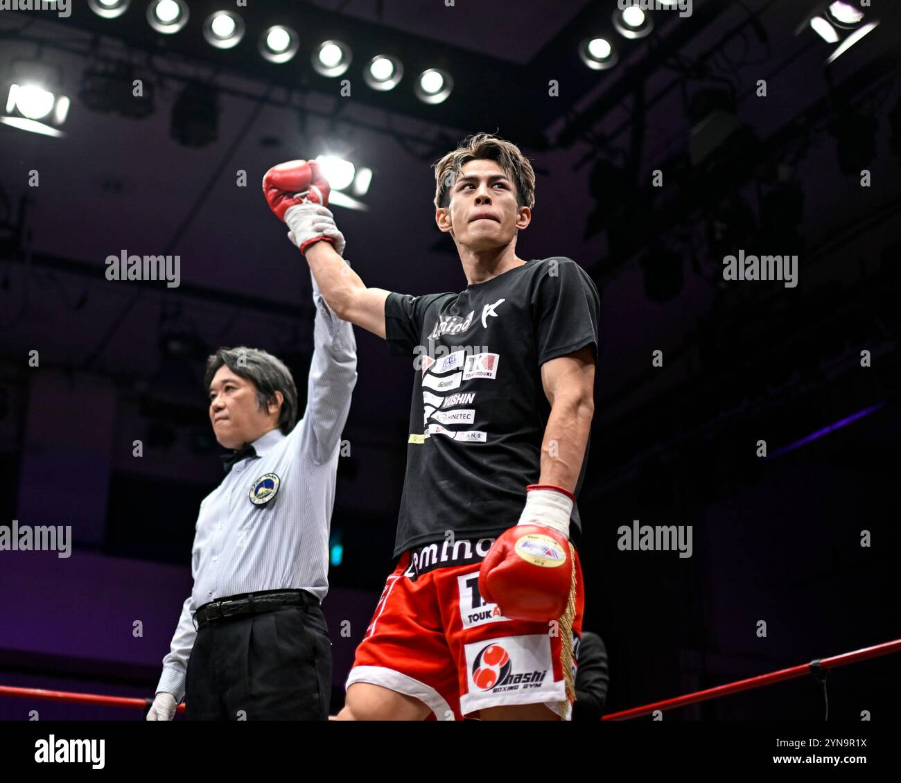 Japan's Masanori Rikiishi celebrates with referee Tetsuya Iida after ...