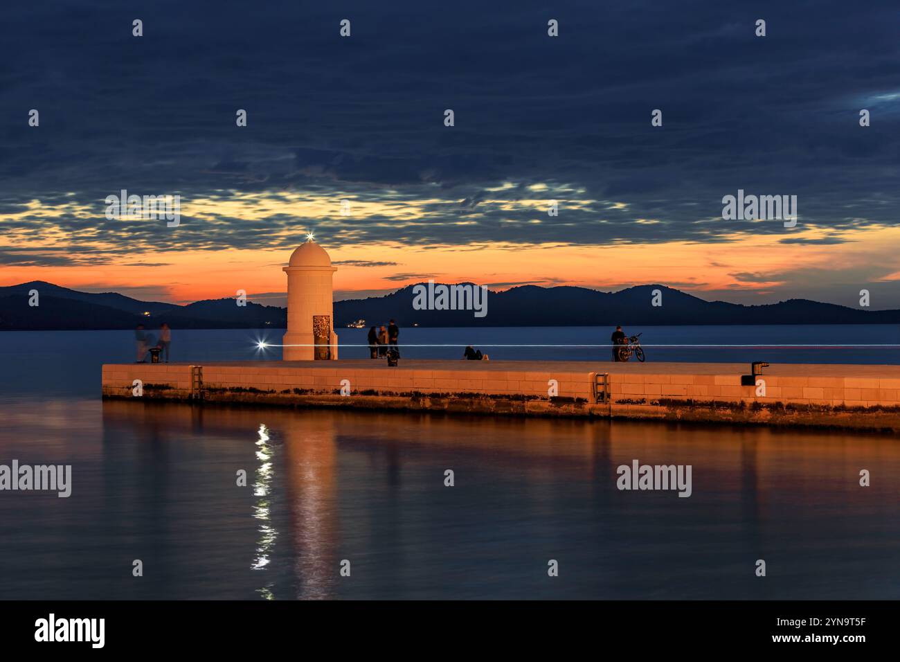Dramatic sunset seen from the most famous sunset place in Zadar. Photo ...