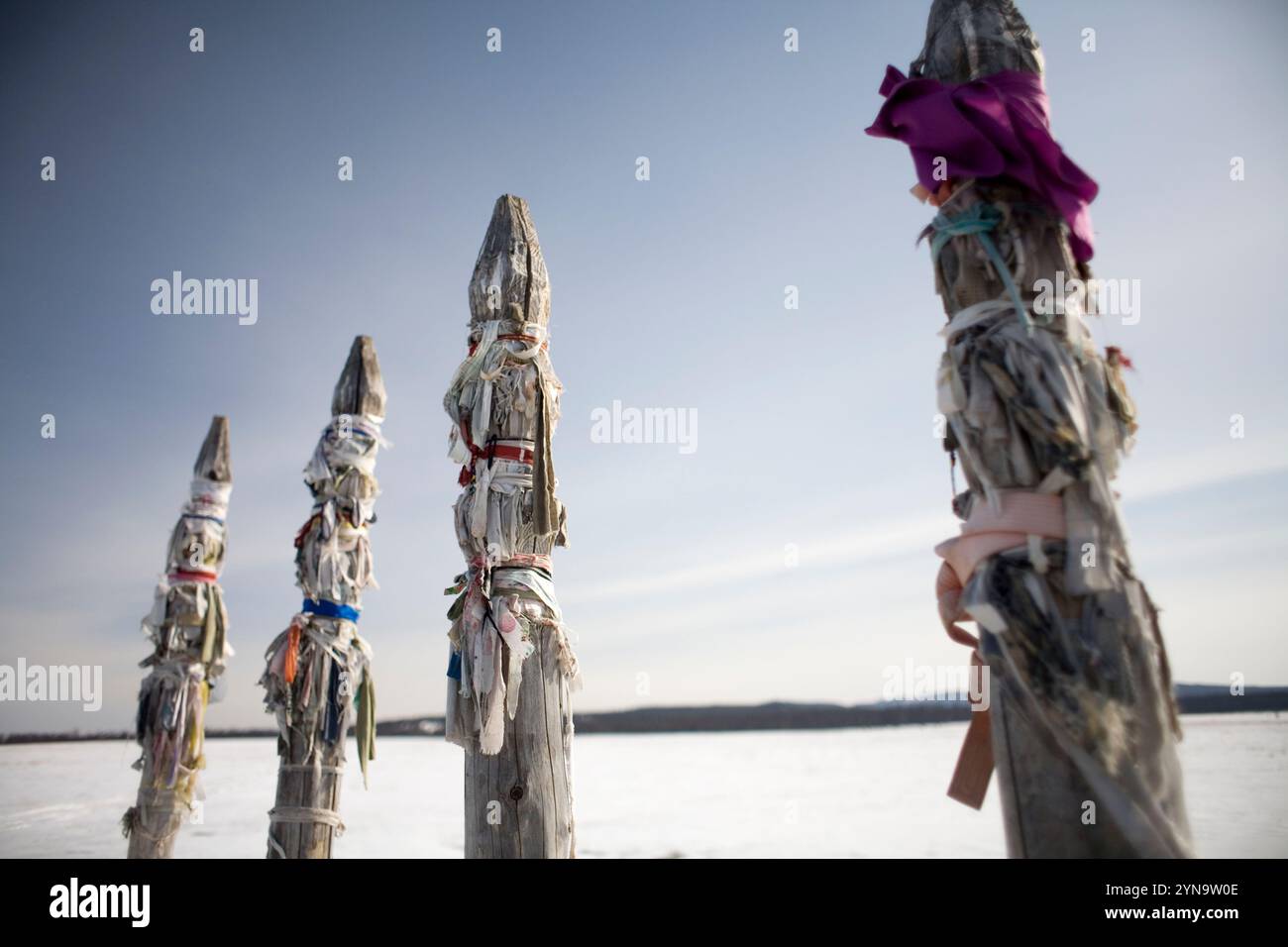 Ceremonial Shaman prayer rags tied to poles by locals on Olkhon Island ...