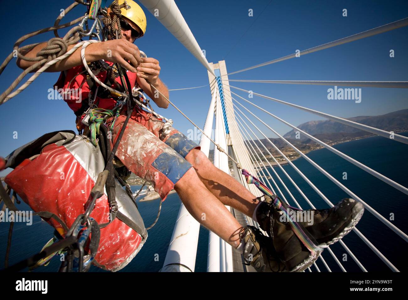 A man working on the maintenance of the world's longest cable-stayed ...