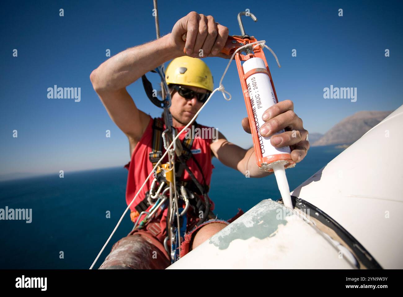 A man working on the maintenance of the world's longest cable-stayed ...