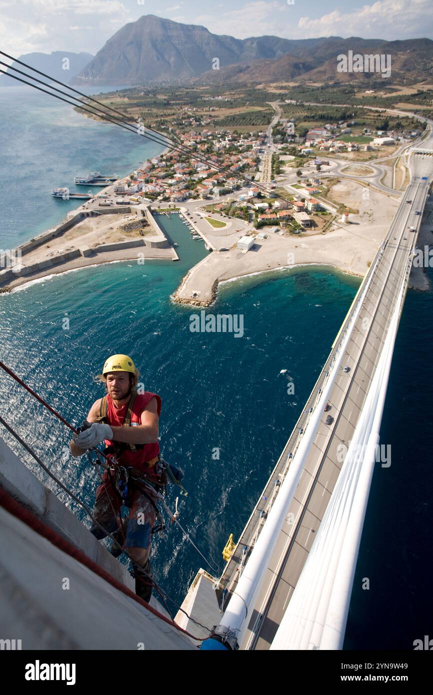 A man working on the maintenance of the world's longest cable-stayed ...