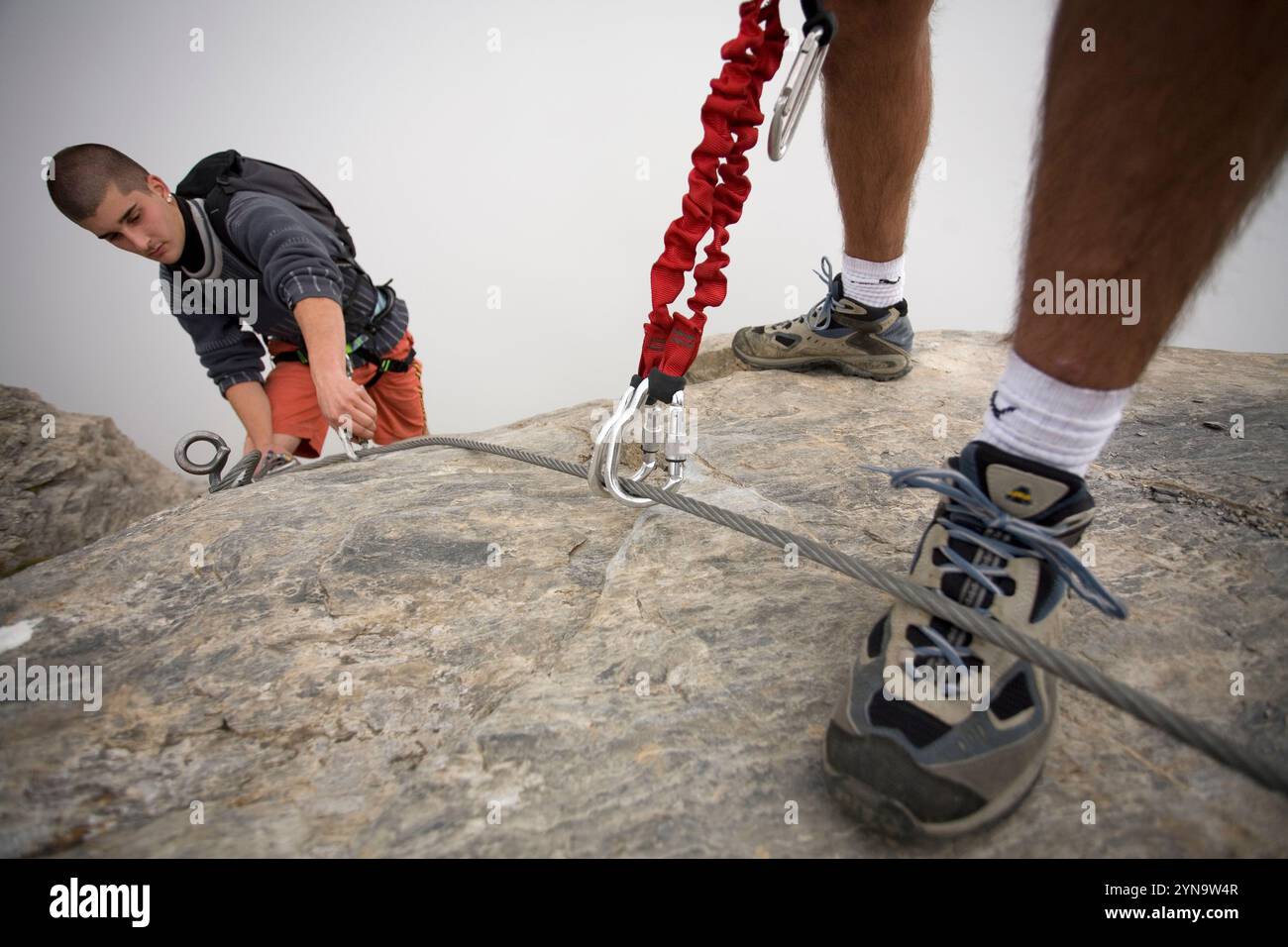 A close-up of a man's technical gear while engaging in the sport of Via ...