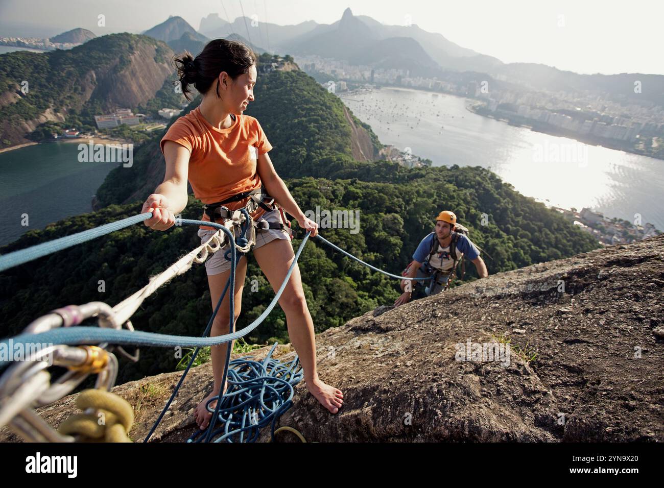 Two friends rock climbing in Rio de Janeiro, Brazil Stock Photo - Alamy