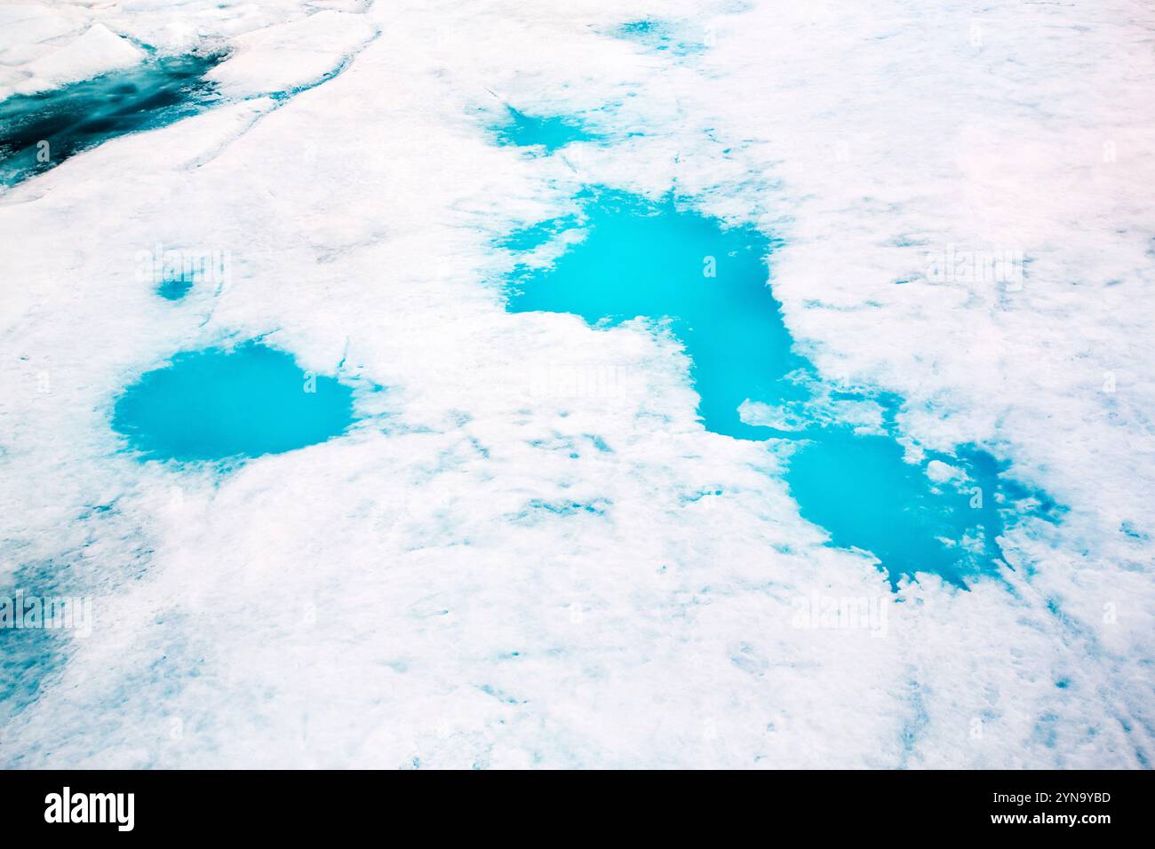 Snow and ice and blue spots Stock Photo - Alamy
