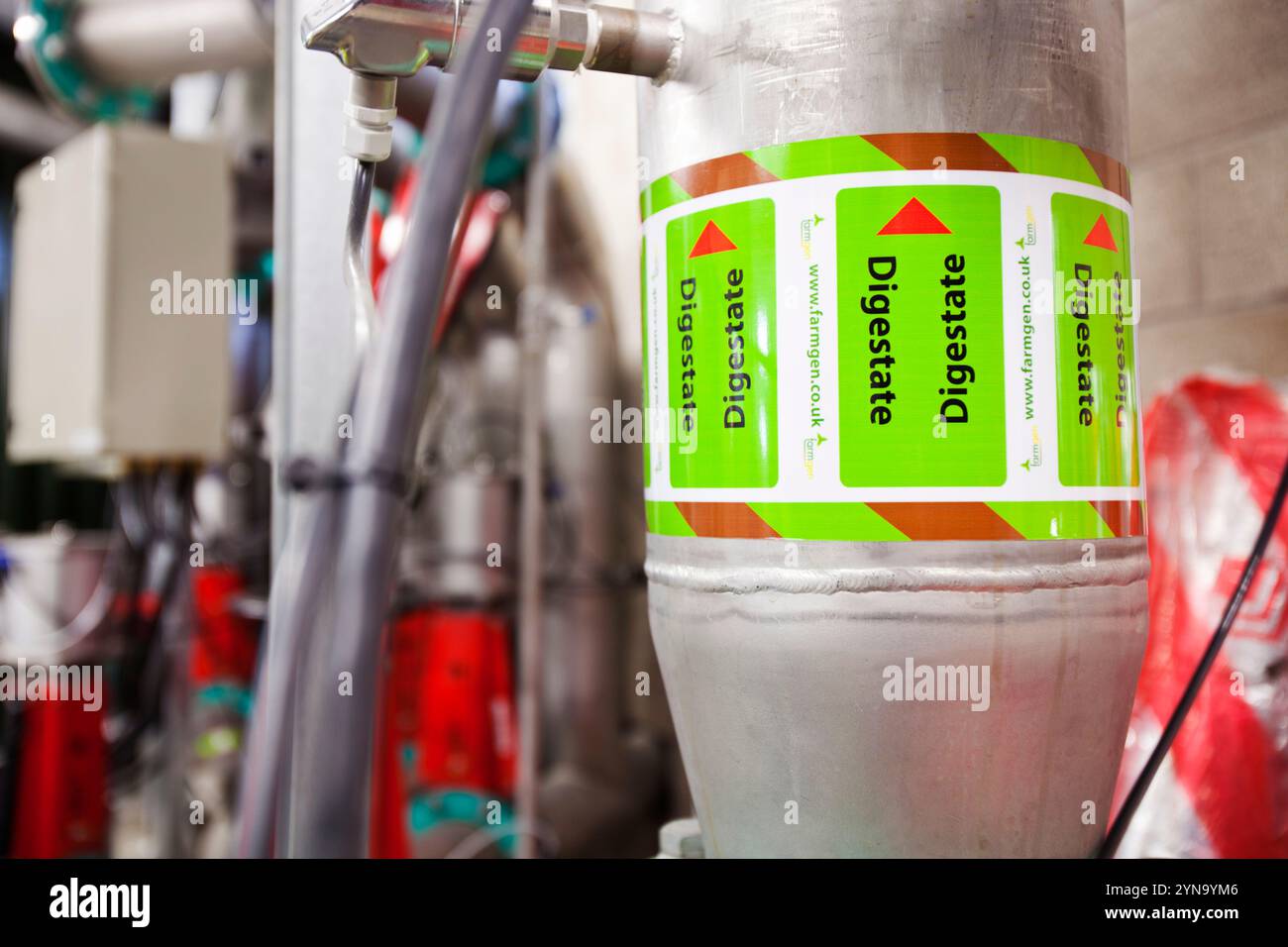 Pipe with sticker at anaerobic bio digester Stock Photo - Alamy