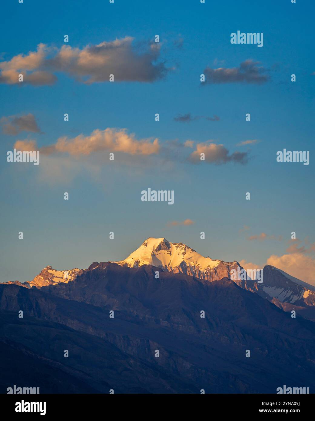 Vertical sunset landscape view of Karl Marx peak in Shakhdara mountain ...