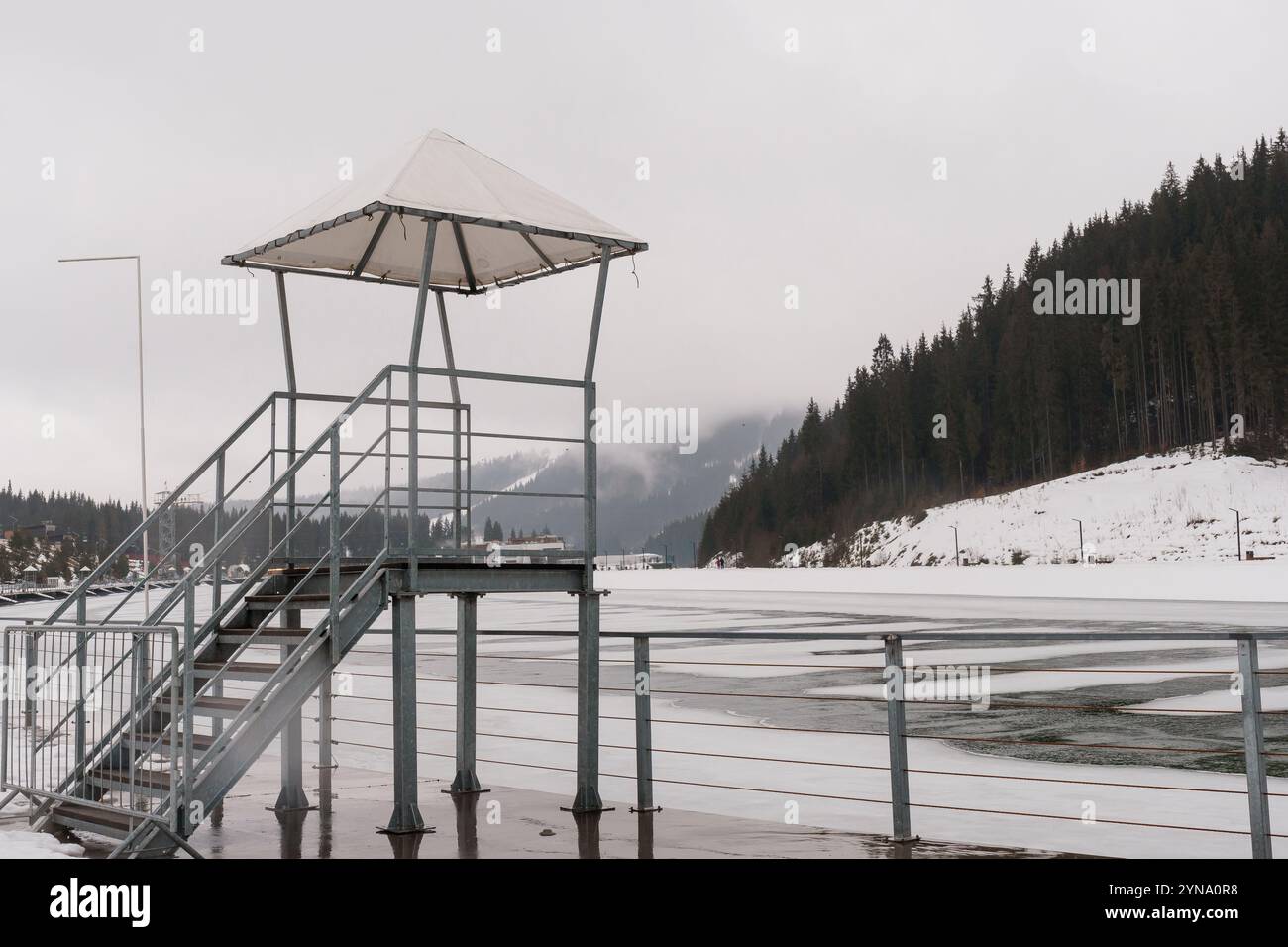 Peaceful Winter Scenery Featuring a Stilted Observation Platform by a ...