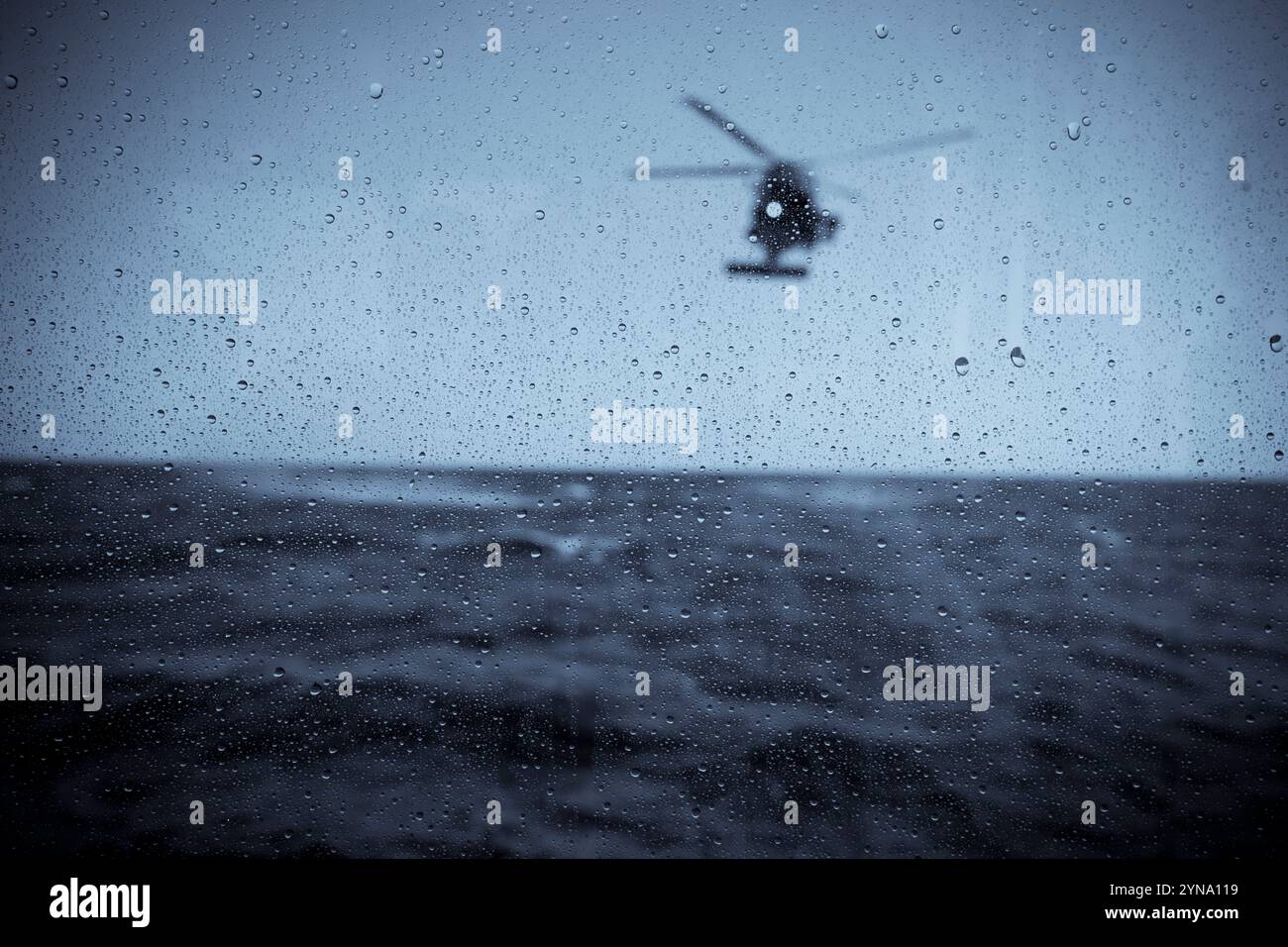 USCG mock rescue mission. Blurry window shot Stock Photo - Alamy