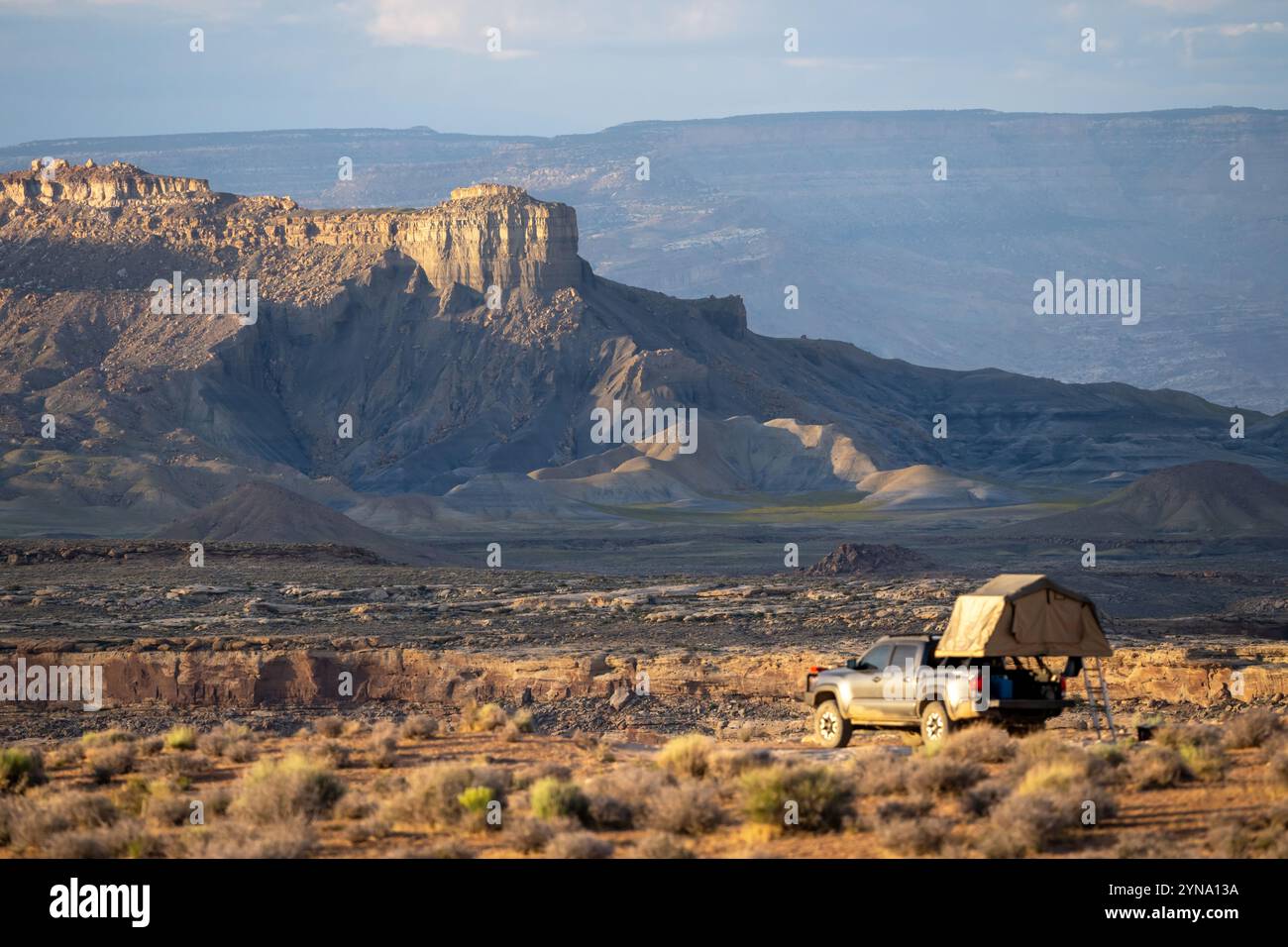 A 4x4 set up with rooftop tent on a remote spot in Lake Powell at ...