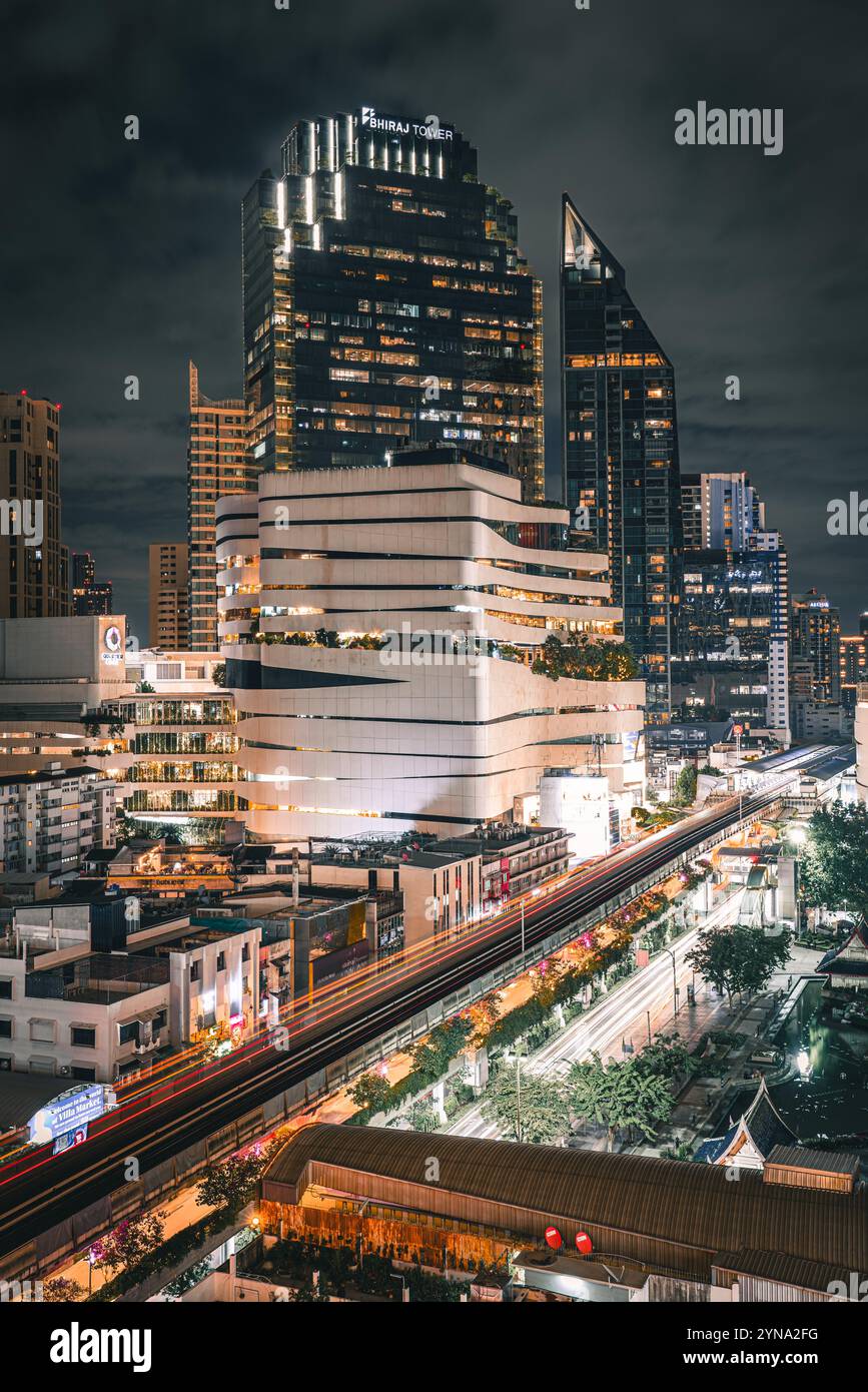 A nighttime view of Bangkok's vibrant urban landscape, with illuminated ...