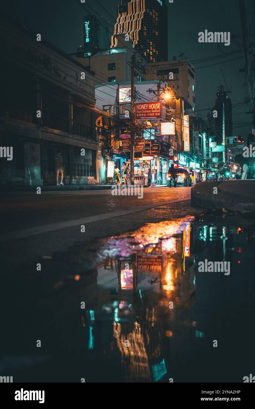 A nighttime view of Bangkok's vibrant urban landscape, with illuminated ...